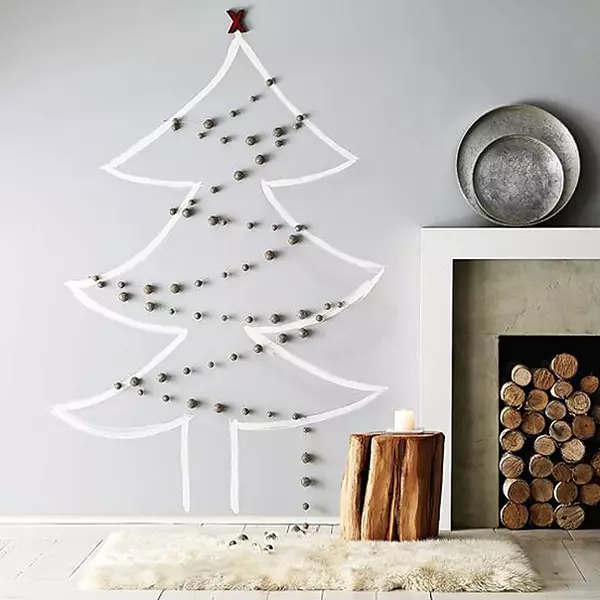 Pohon Natal di dinding. Bagaimana cara membuat pohon tahun baru di dinding?