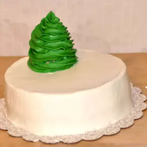 Nyttårs tårta träd. Tårta i form av ett julgran